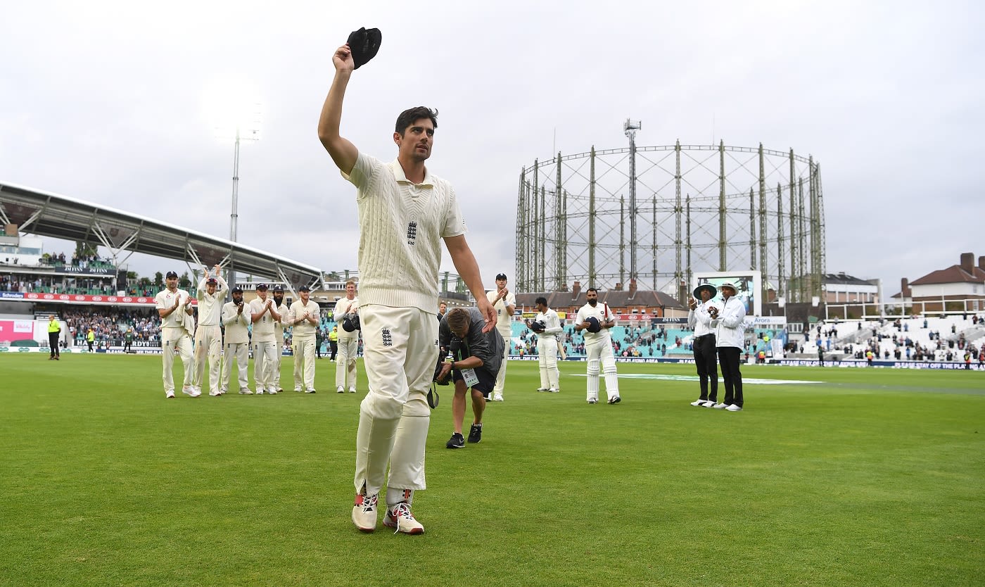 Alastair Cook leads the players off the field at the end of his final ...