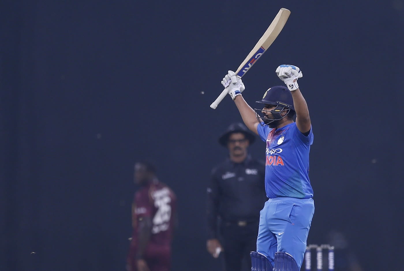 Rohit Sharma salutes the crowd after scoring a century | ESPNcricinfo.com