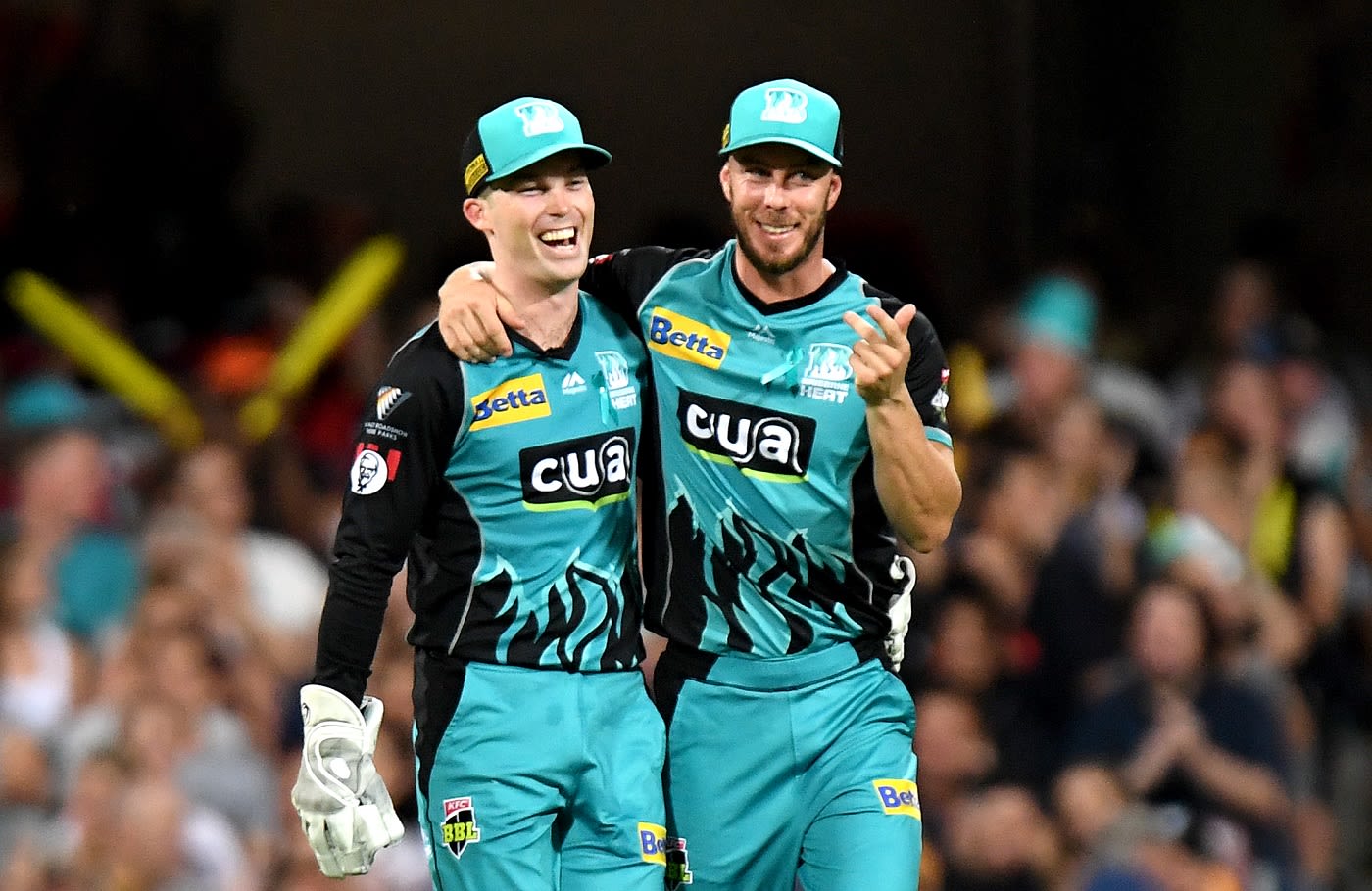 Jimmy Pierson and Chris Lynn share a light moment | ESPNcricinfo.com