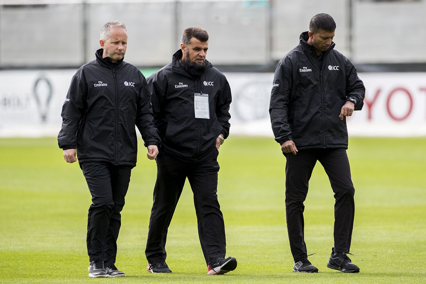 The umpires head out for another inspection | ESPNcricinfo.com