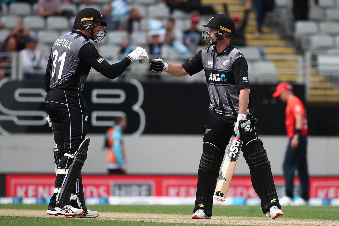 Martin Guptill and Colin Munro celebrate a boundary | ESPNcricinfo.com