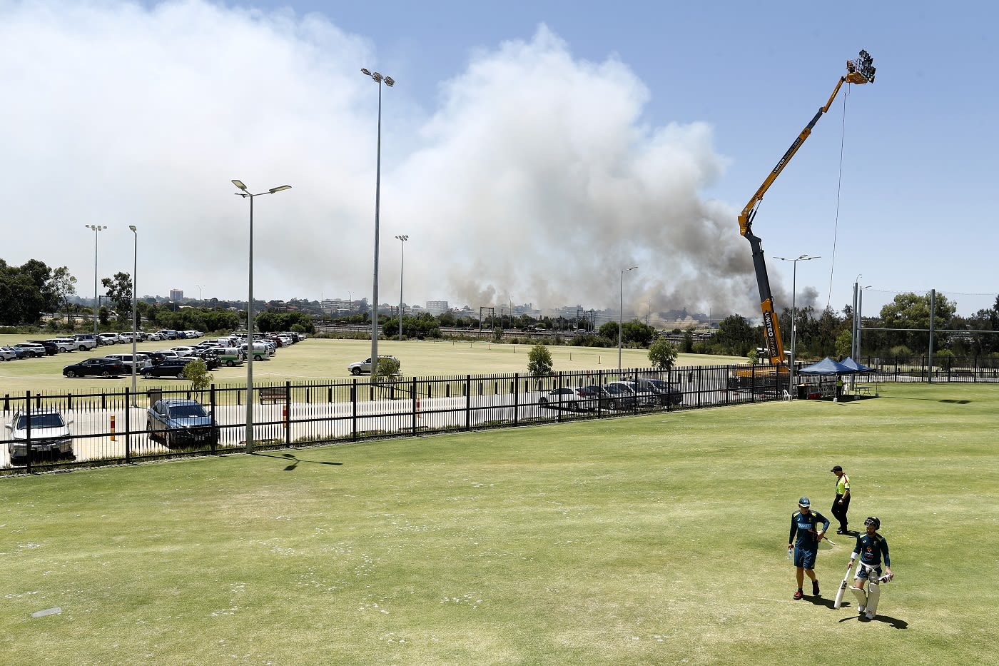 Smoke from a grass fire at Belmont Park Racecourse, near the Optus ...