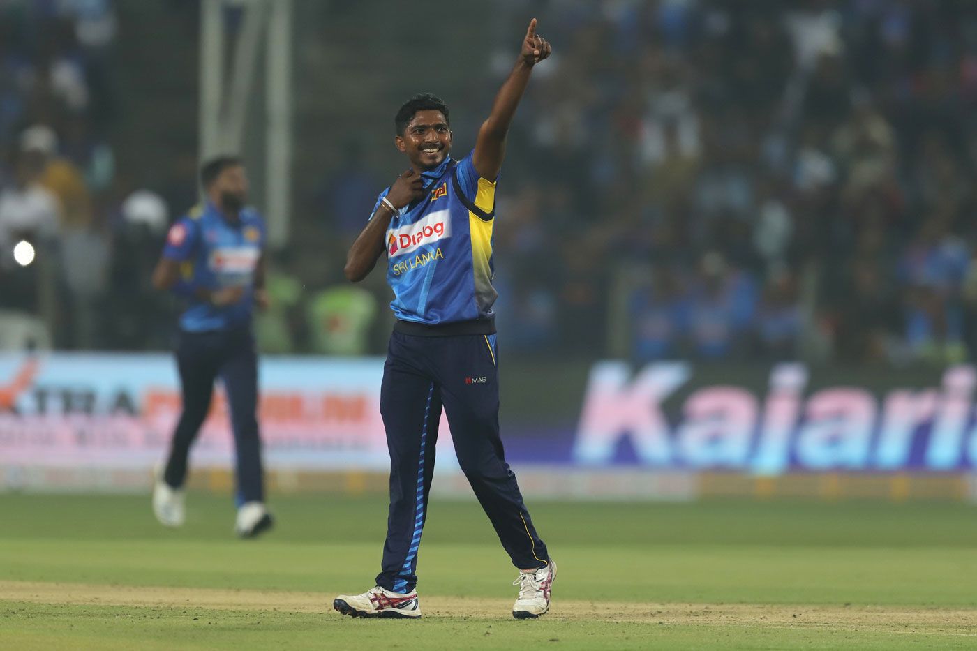 Lakshan Sandakan gestures after taking a wicket | ESPNcricinfo.com