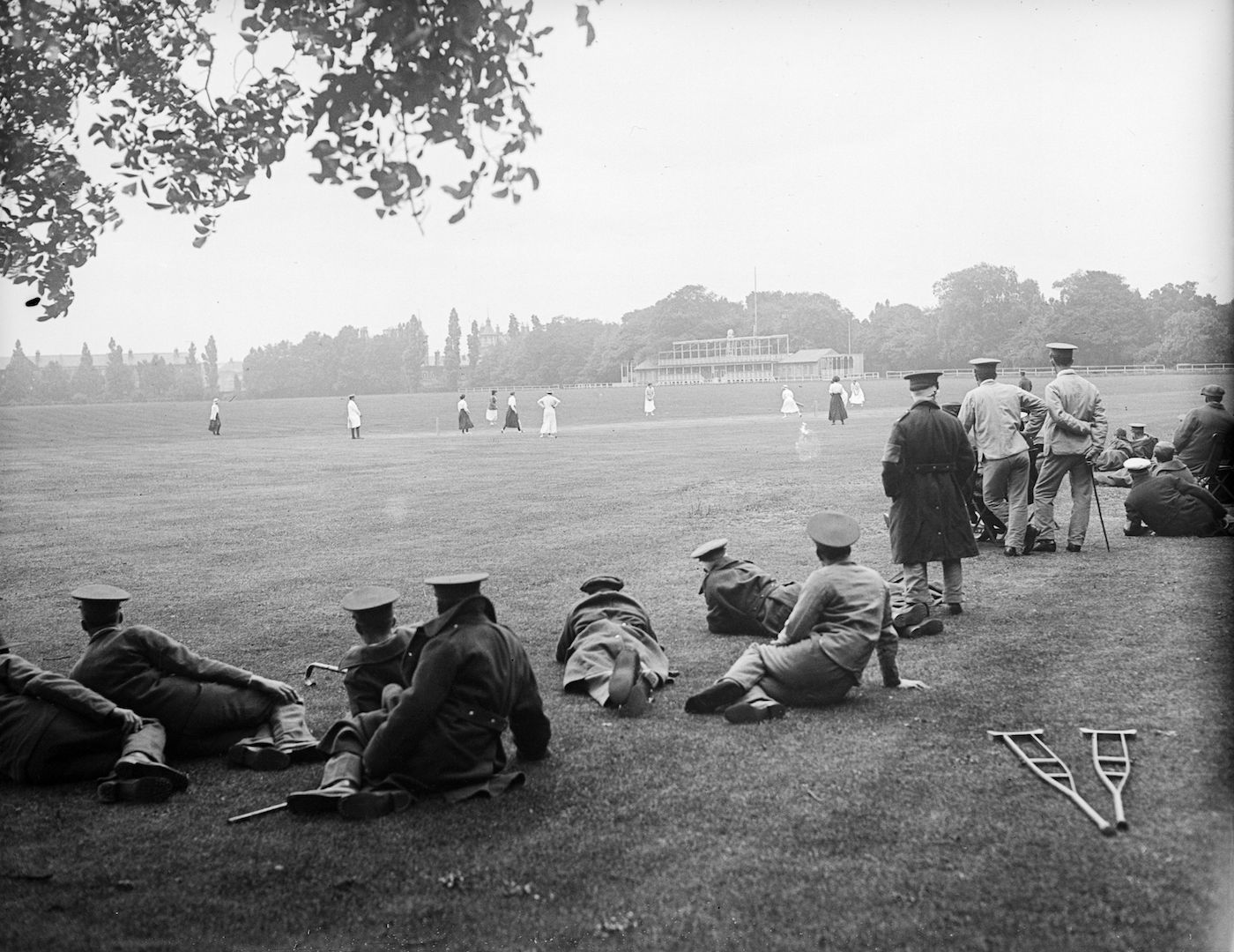 Convalescing WWI soldiers watch a ladies' cricket match at Hurlingham ...