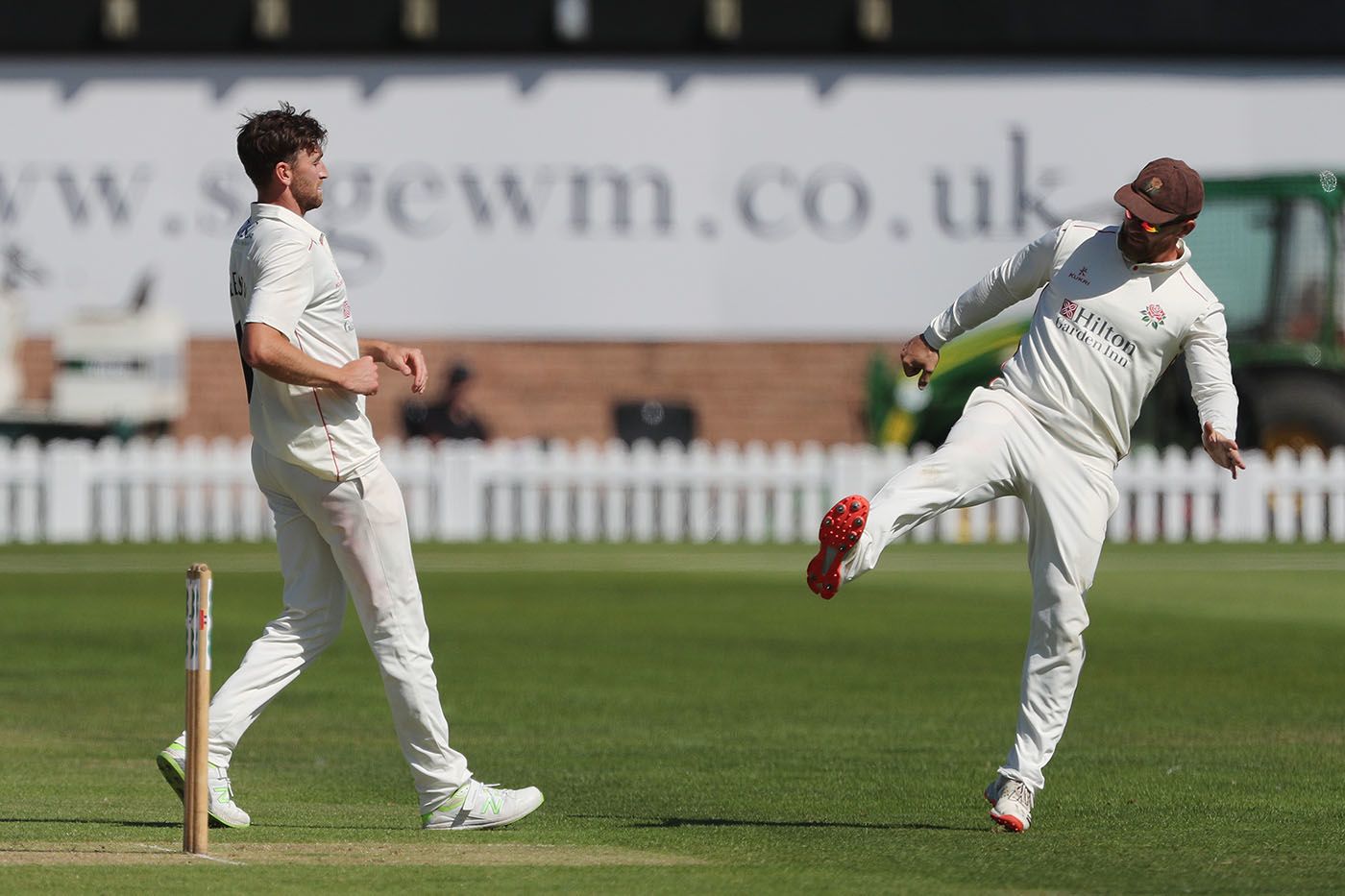 Richard Gleeson is offered a celebratory boot by Dane Vilas ...