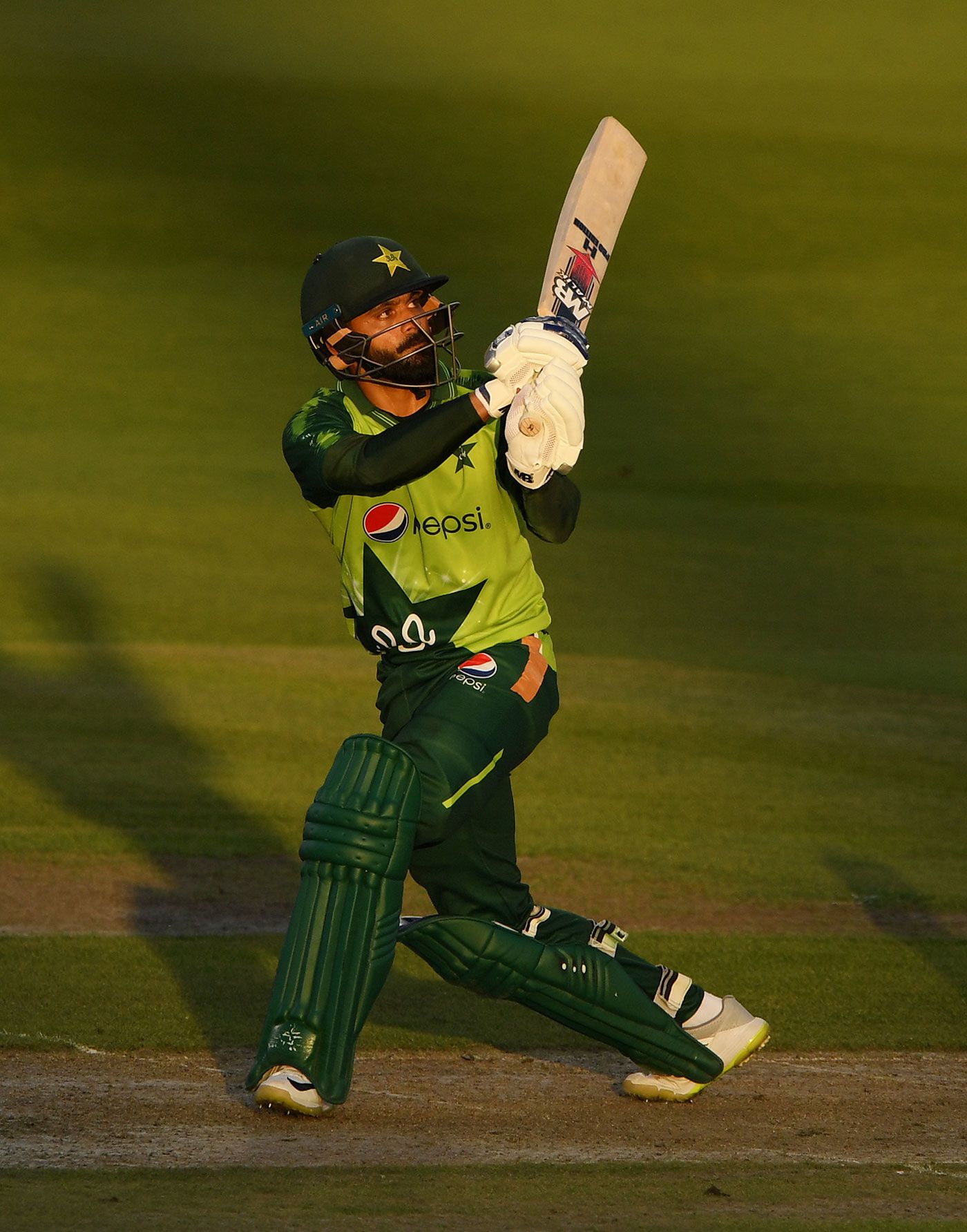 Mohammad Hafeez launches another shot over the leg side | ESPNcricinfo.com