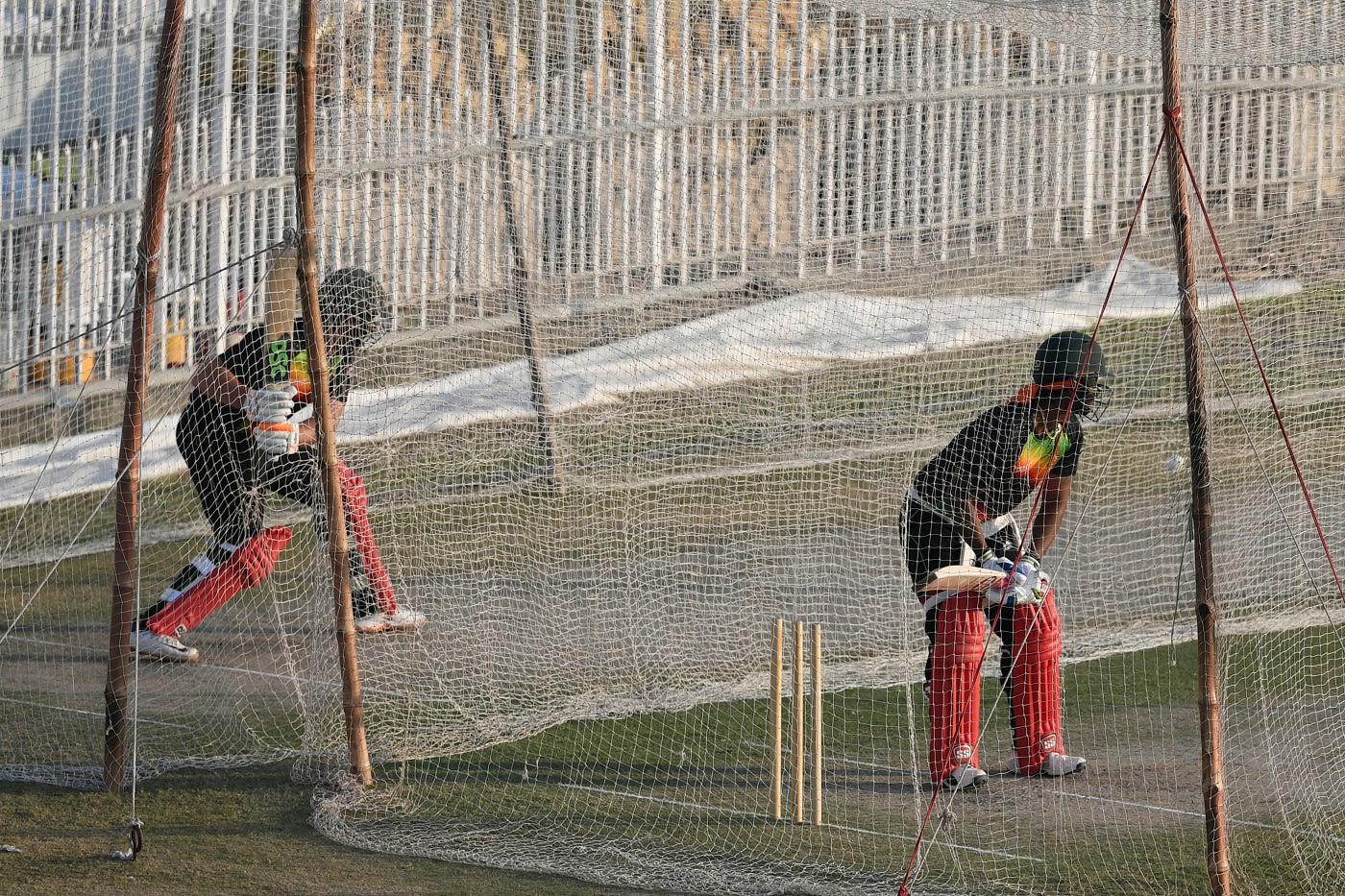 Chamu Chibhabha (R) and Brendan Taylor have a hit in the nets in ...