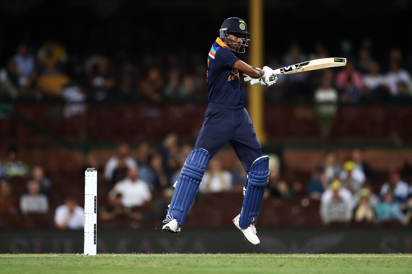 An airborne Hardik Pandya plays one on the off side | ESPNcricinfo.com
