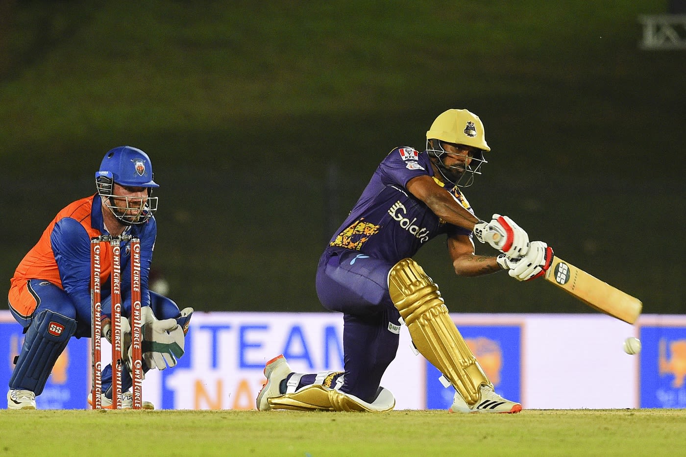 Danushka Gunathilaka rolls out a sweep | ESPNcricinfo.com