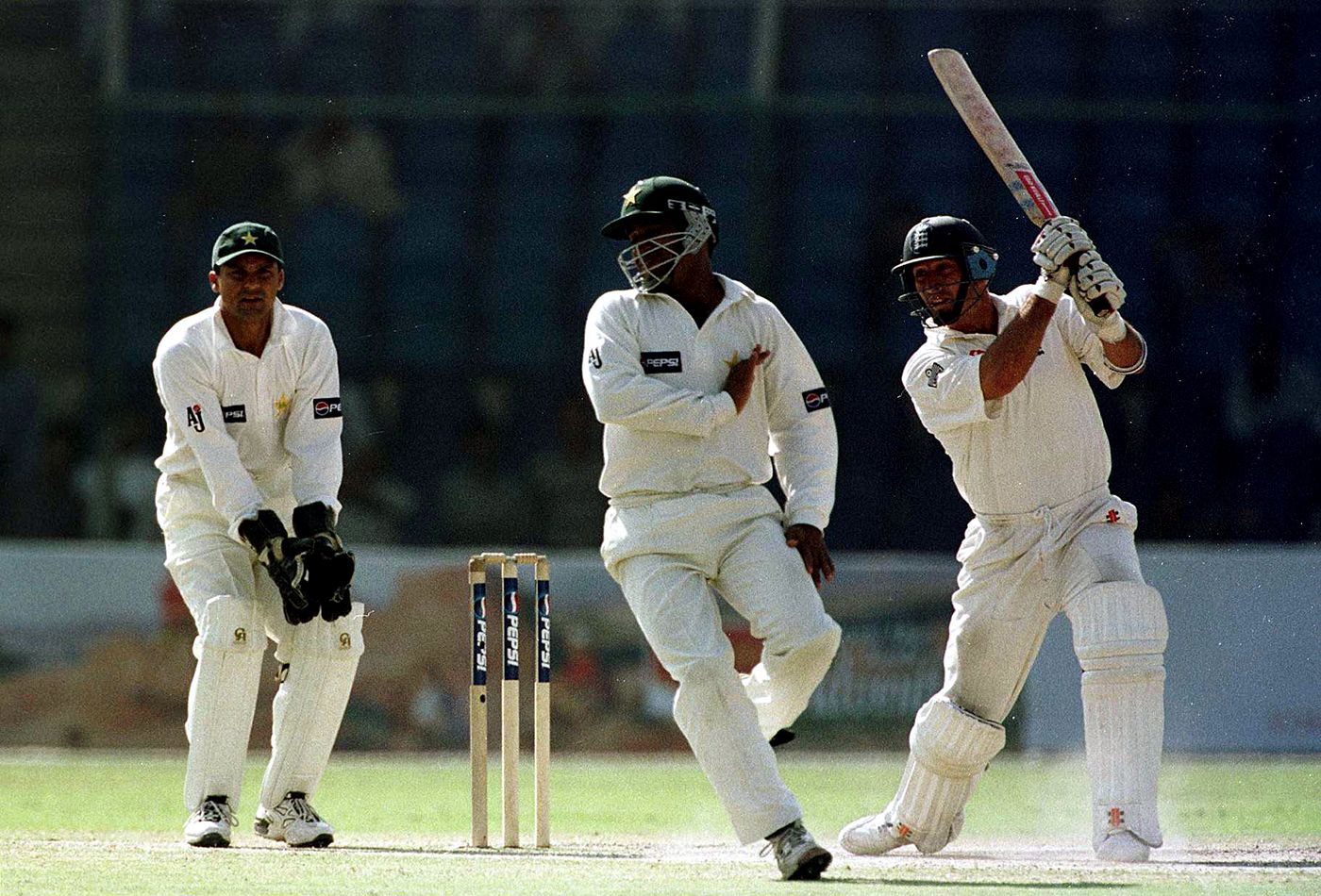 Nasser Hussain drives past Yousuf Youhana at silly point | ESPNcricinfo.com