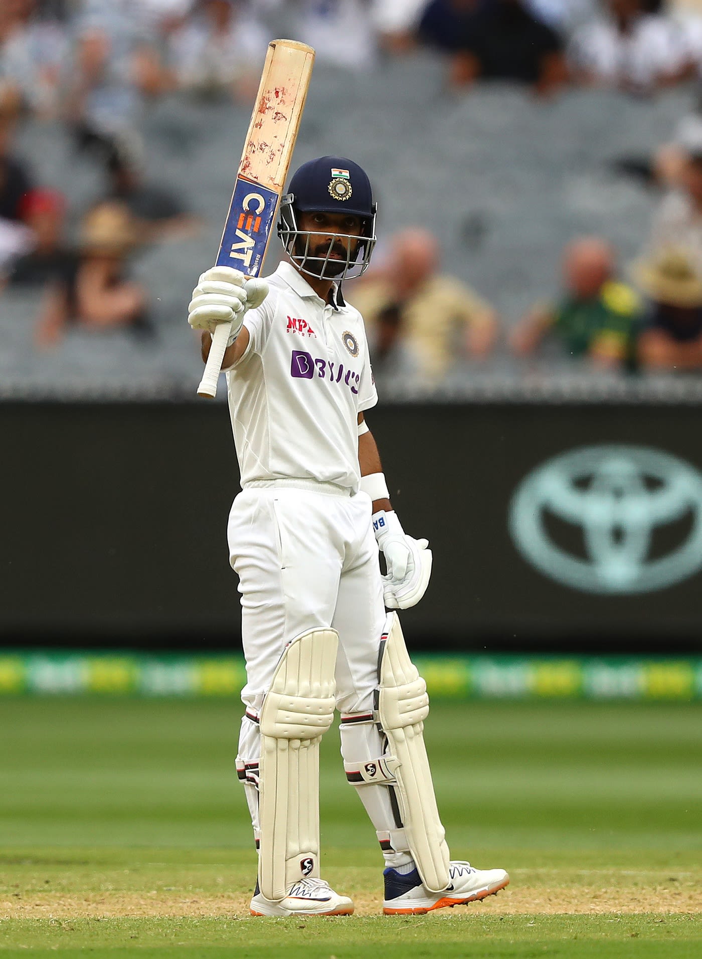 Ajinkya Rahane raises the bat after reaching his fifty | ESPNcricinfo.com