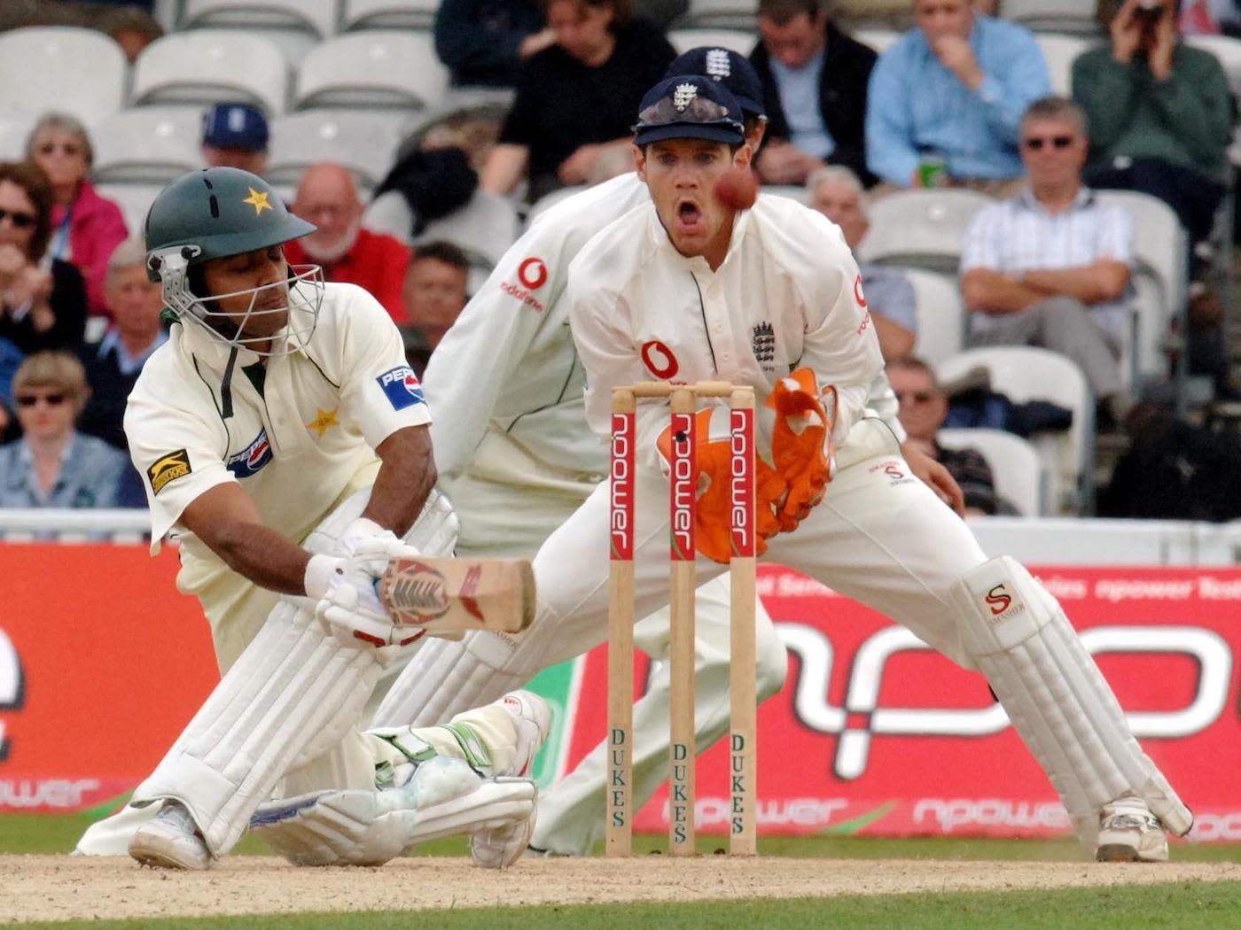 Mohammad Hafeez sweeps away a ball as Chris Read looks on | ESPNcricinfo.com