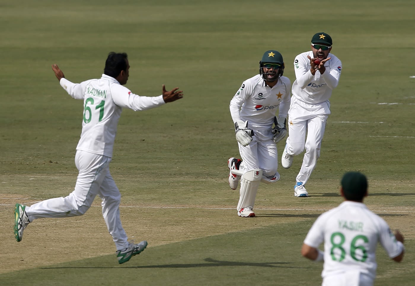 Nauman Ali wheels away in celebration | ESPNcricinfo.com