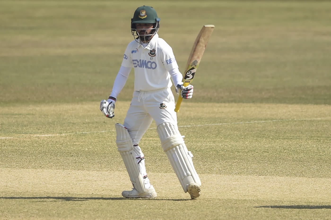 Mominul Haque acknowledges the applause on getting to a landmark ...