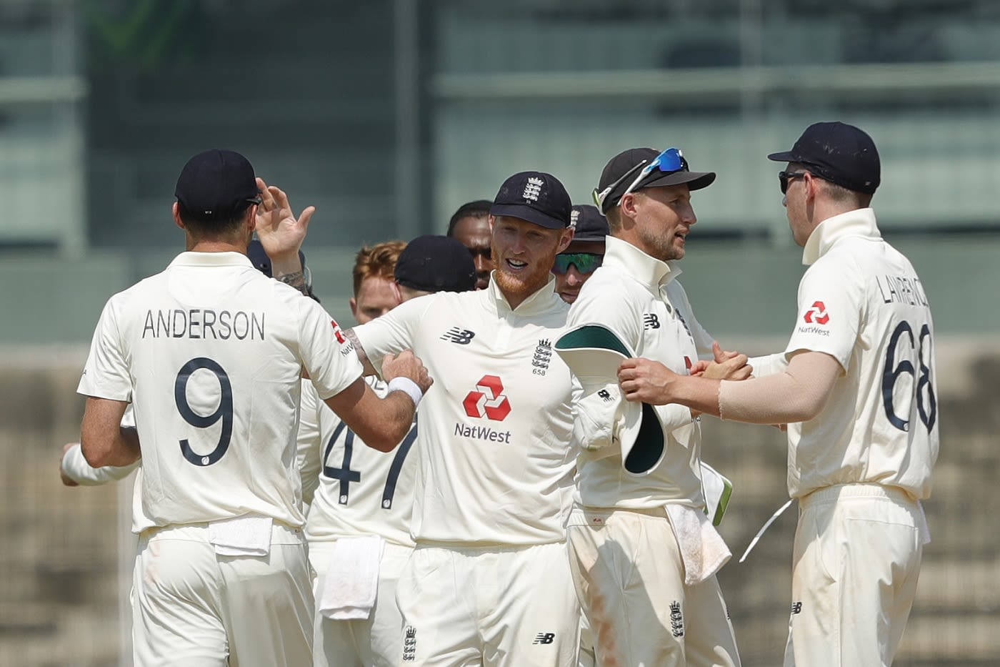 The England players celebrate their huge win | ESPNcricinfo.com
