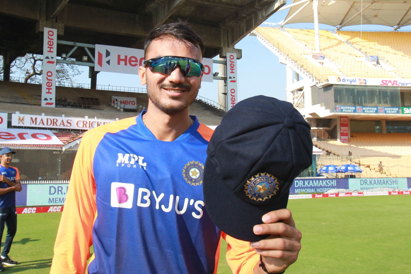 Axar Patel shows off his brand new Test cap | ESPNcricinfo.com
