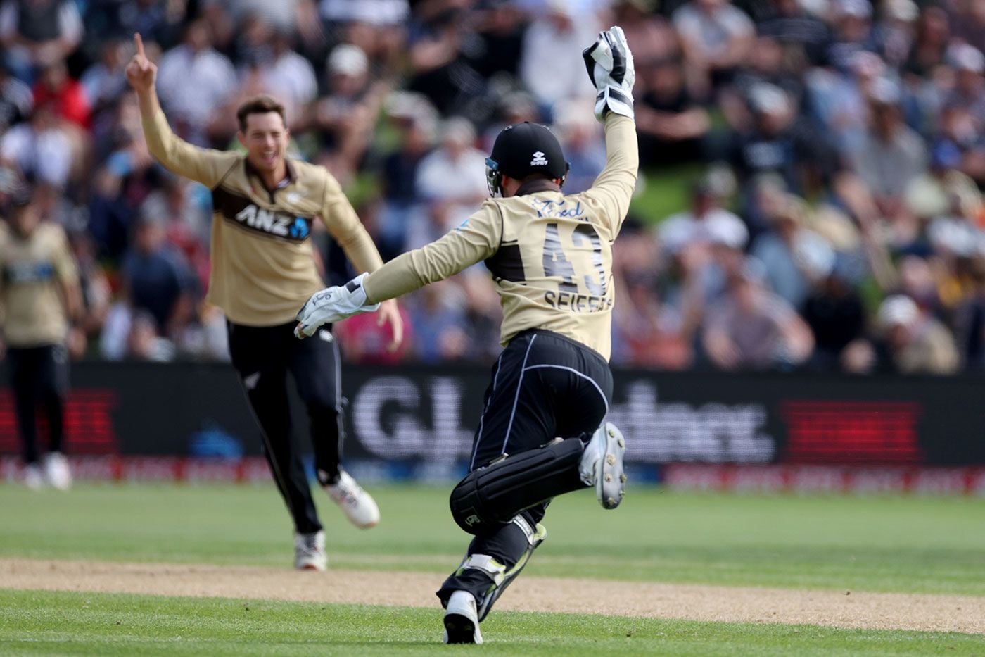 Tim Seifert takes the catch to give Mitchell Santner his third wicket ...