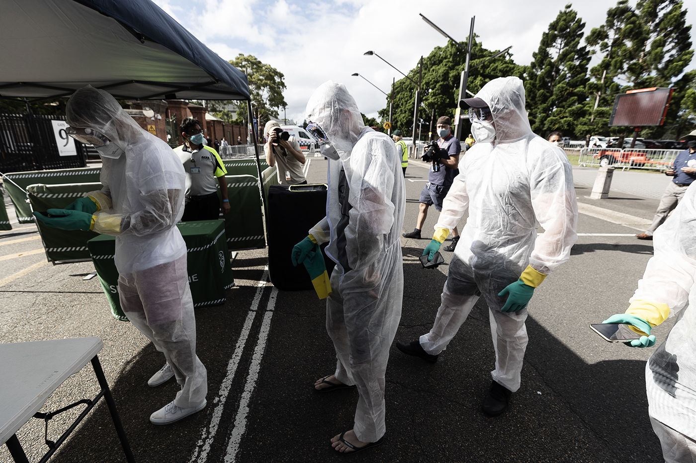 Spectators turn up at the SCG wearing PPE kits as fancy dress ...
