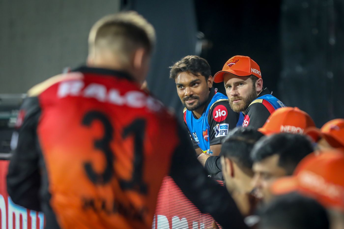 Sandeep Sharma and Kane Williamson watch from the sidelines ...