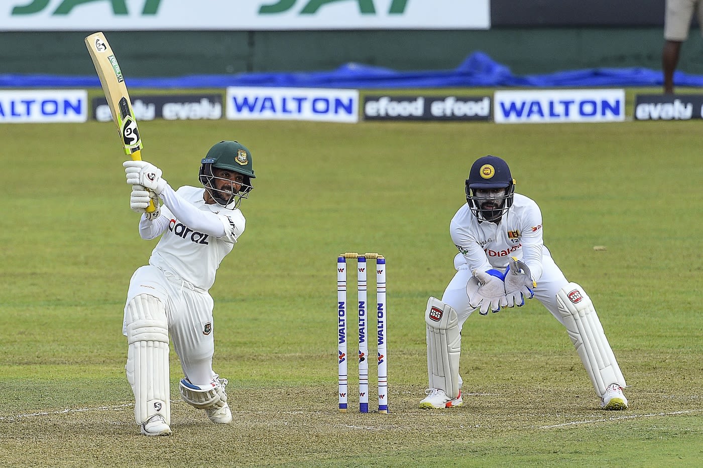 Mominul Haque drives in the direction of cover | ESPNcricinfo.com