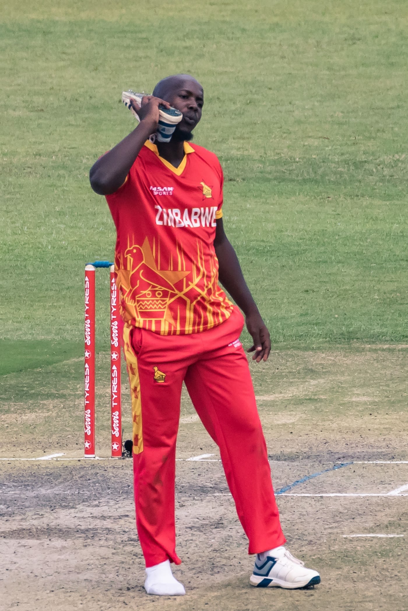 Luke Jongwe pulls out the shoe celebration | ESPNcricinfo.com