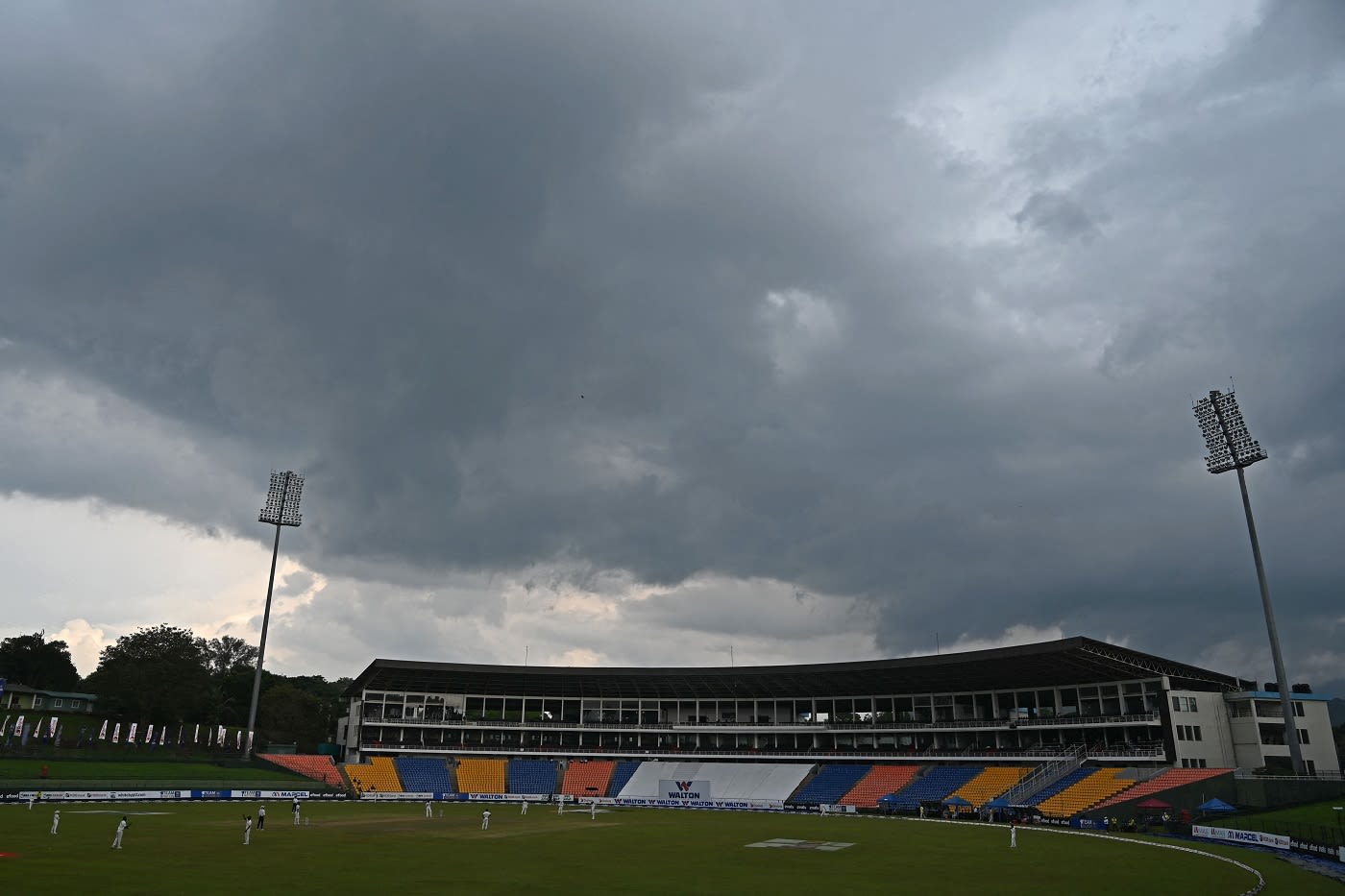 Dark clouds hover around the Pallekele International Cricket Stadium ...