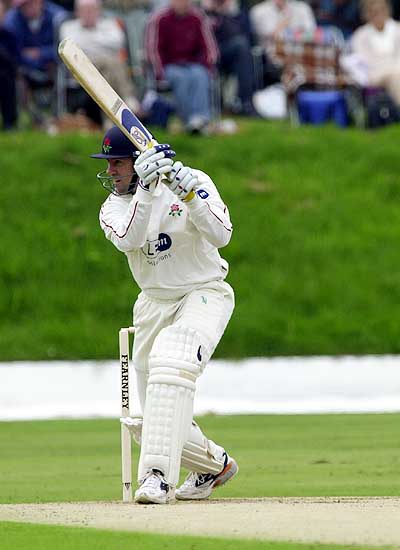 Stuart Law with a thumping off drive from Caddick for four ...