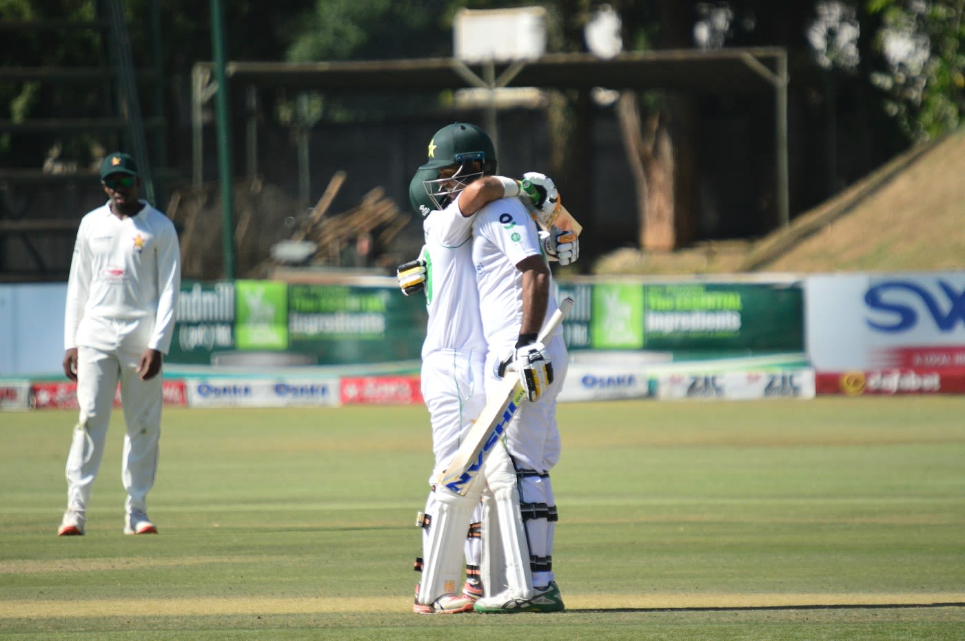 Abid Ali and Nauman Ali embrace each other | ESPNcricinfo.com