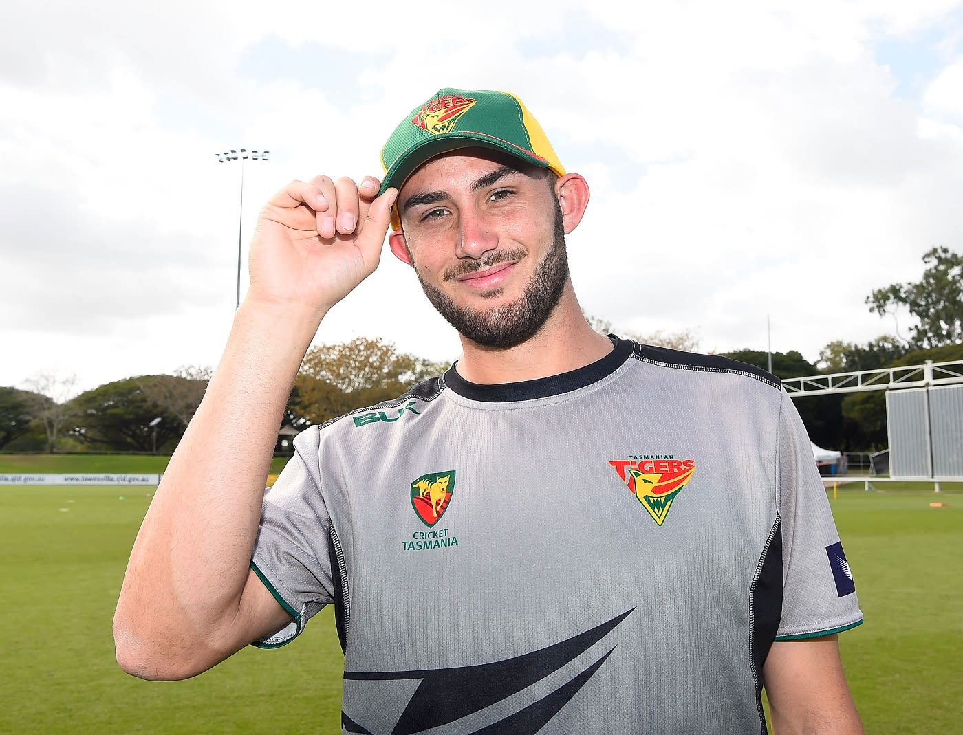 Aaron Summers of the Tigers poses after being presented with his debut ...