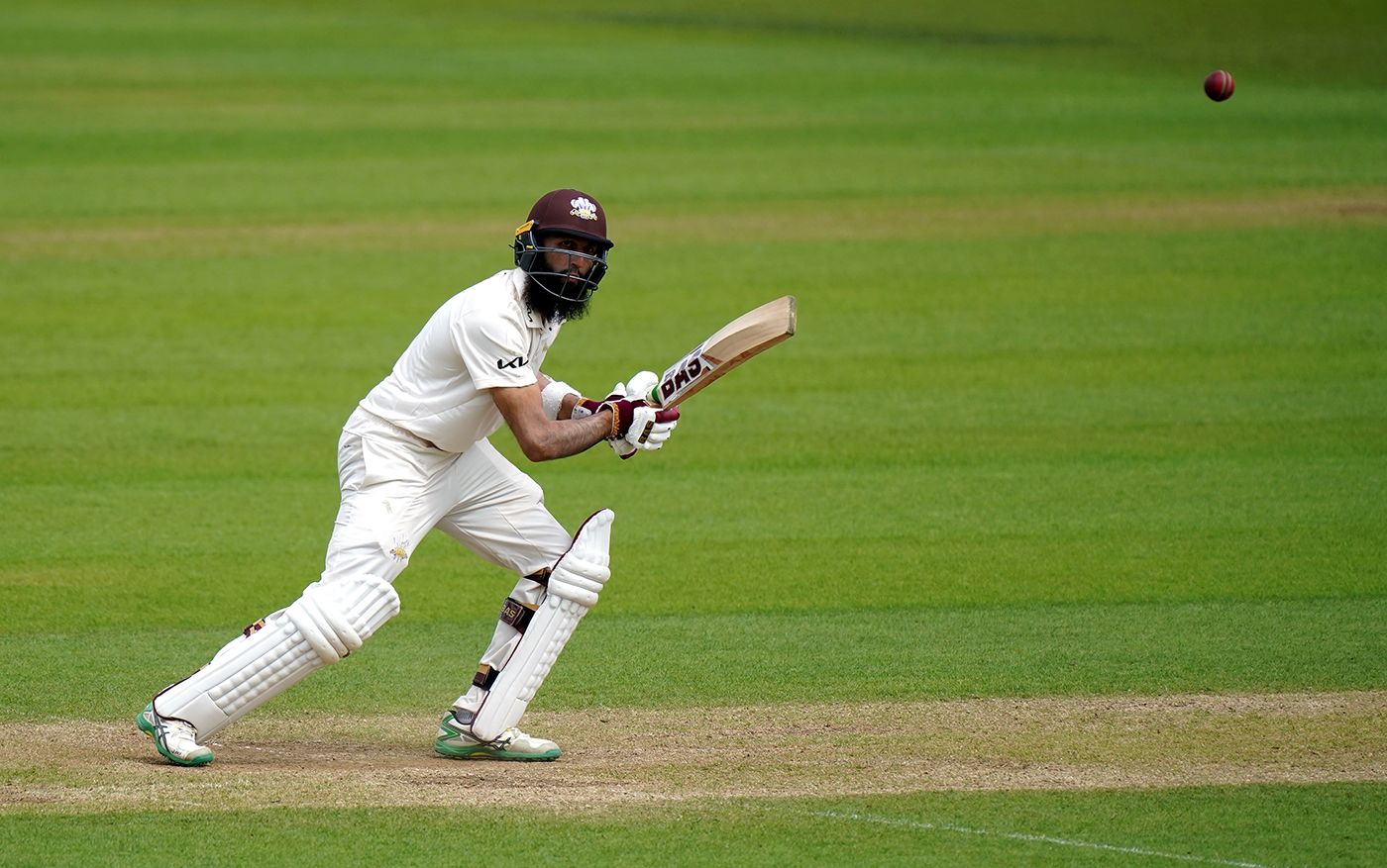 Hashim Amla plays to the off-side en route to his half-century ...