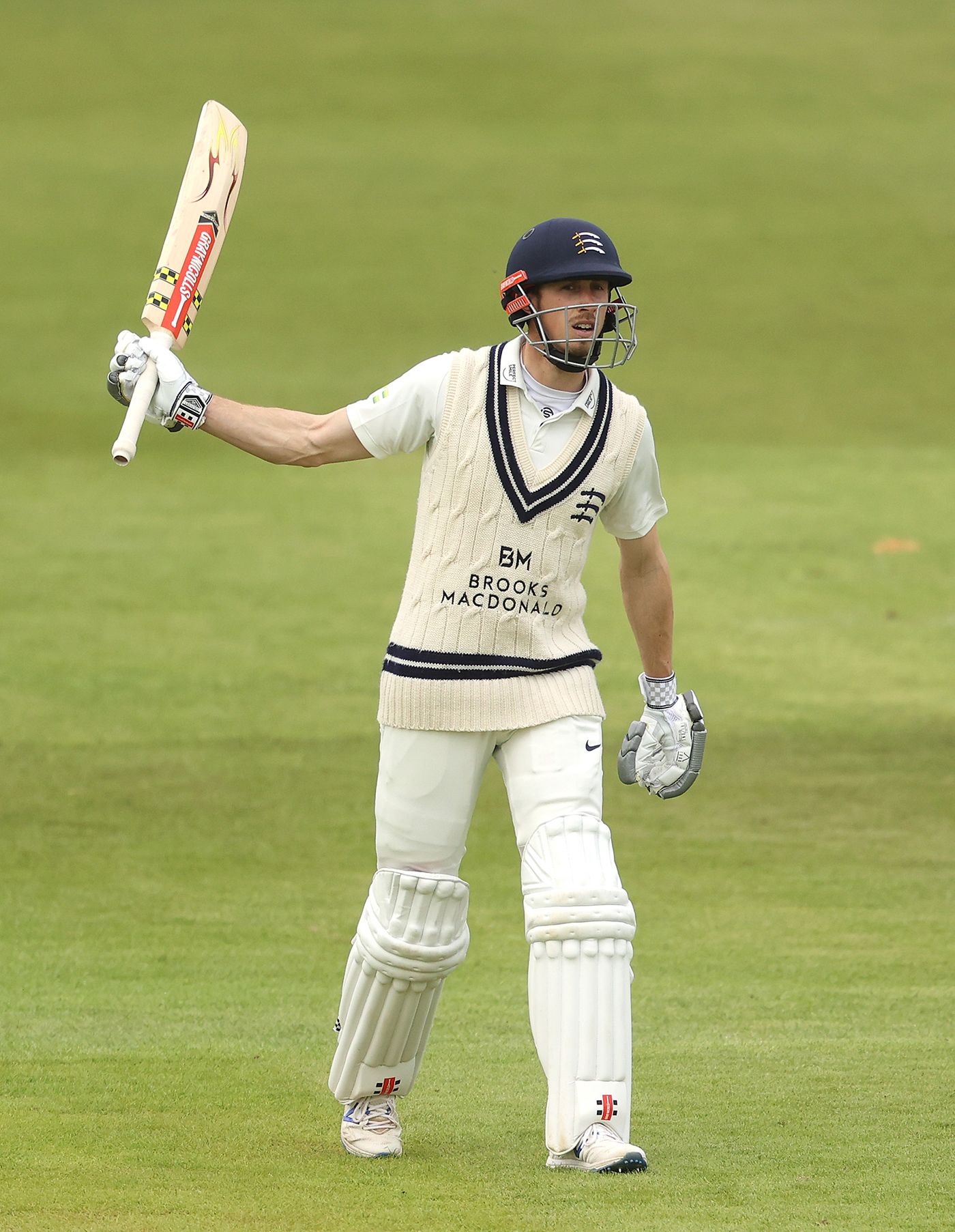 John Simpson celebrates reaching 50 en route to 95 not out ...