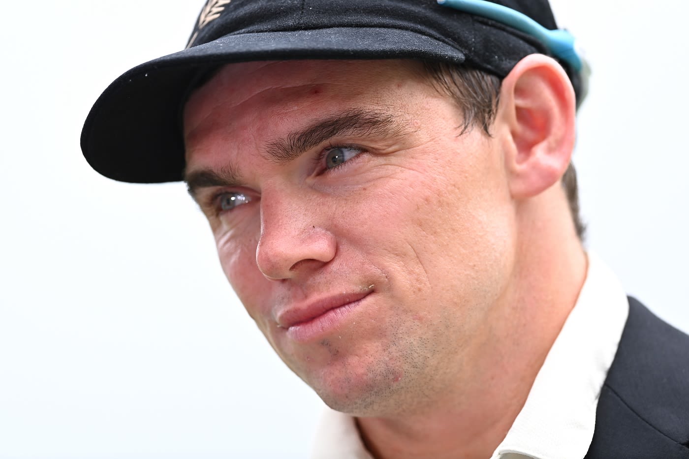 Stand-in captain Tom Latham looks on during a chat with the host ...