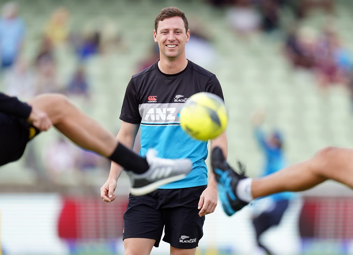 Matt Henry plays spectator as his team-mates play football ...