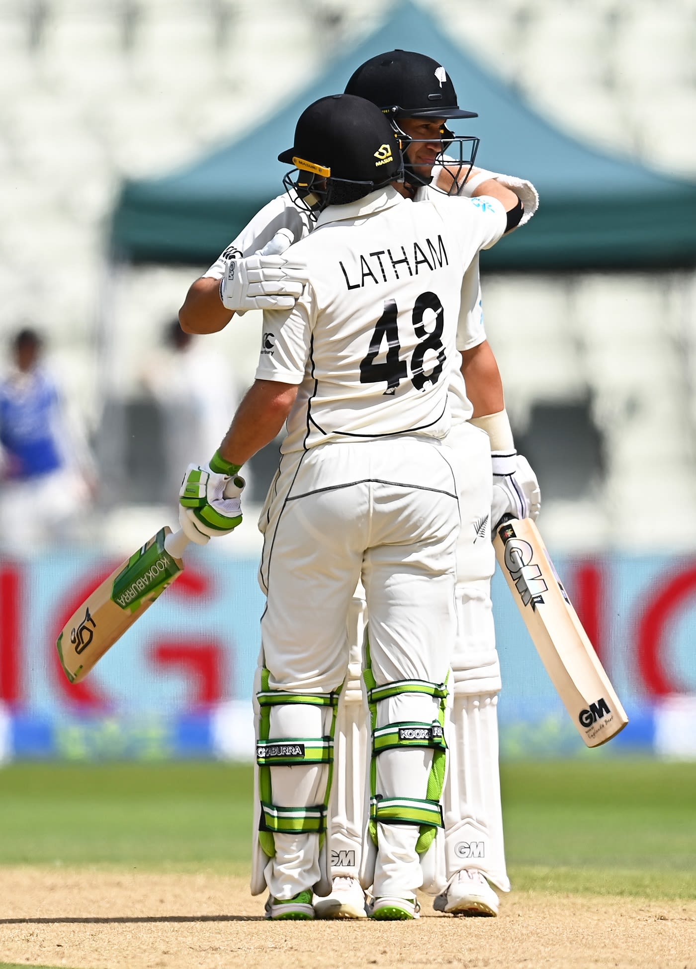 Tom Latham and Ross Taylor embrace after taking New Zealand to victory ...