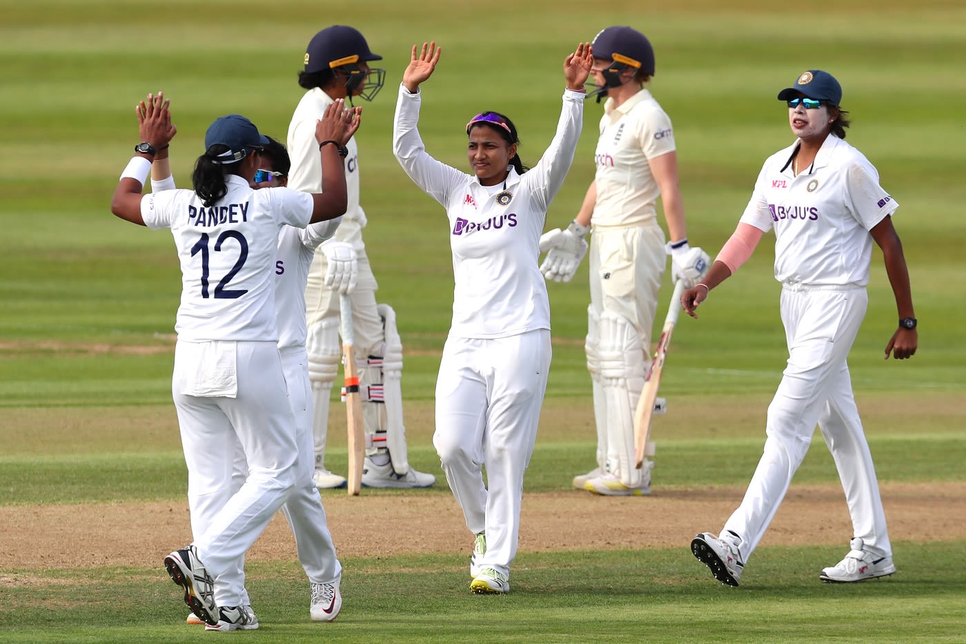 Sneh Rana celebrates one of her three wickets on the first day ...