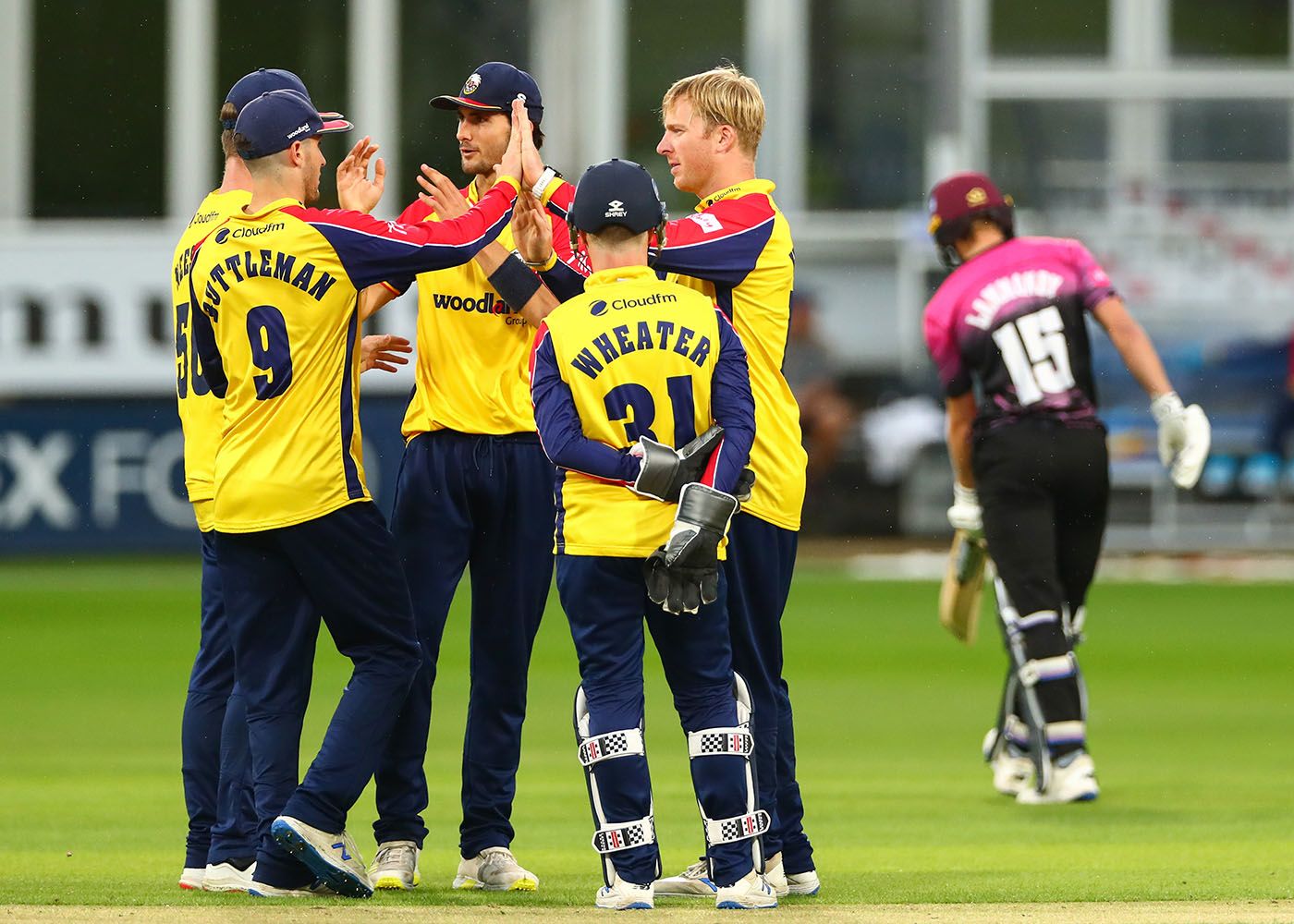 Simon Harmer celebrates with team-mates after bowling Tom Lammonby ...