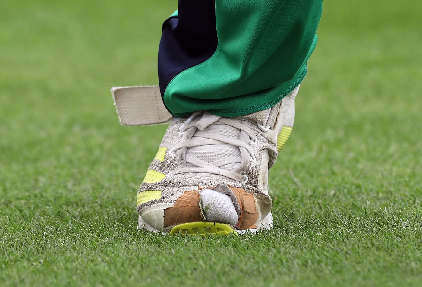A close-up of the toe of Ireland's Josh Little showing through his shoe ...