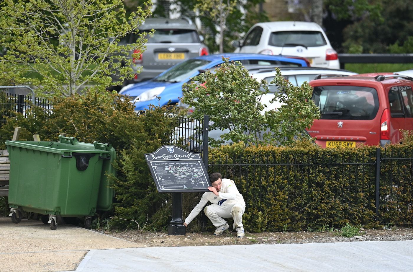 Andrew Salter searches for a ball hit to the boundary Darren Stevens ...