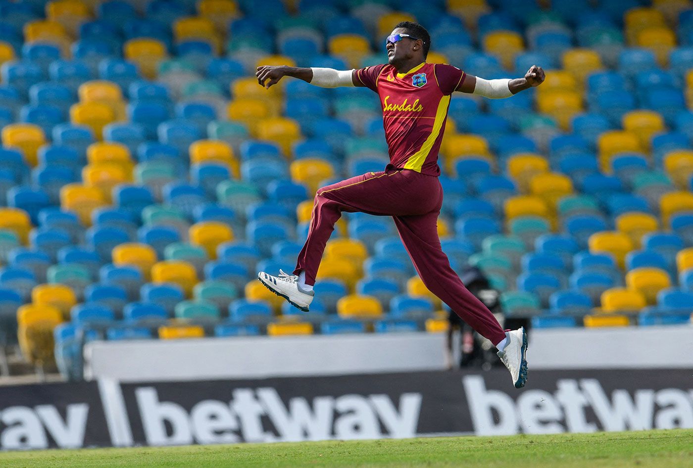 Akeal Hosein leaps in celebration | ESPNcricinfo.com