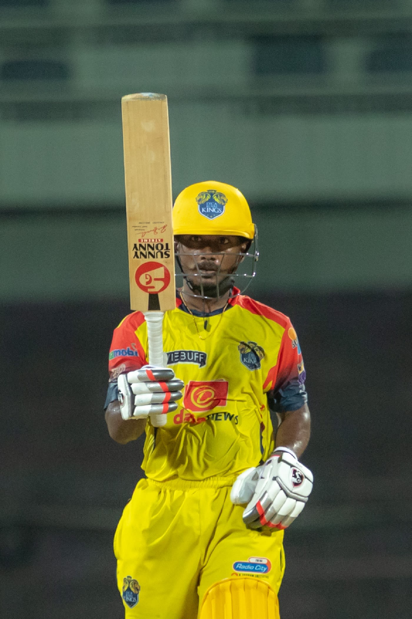 GS Raju raises his bat after getting to a fifty | ESPNcricinfo.com