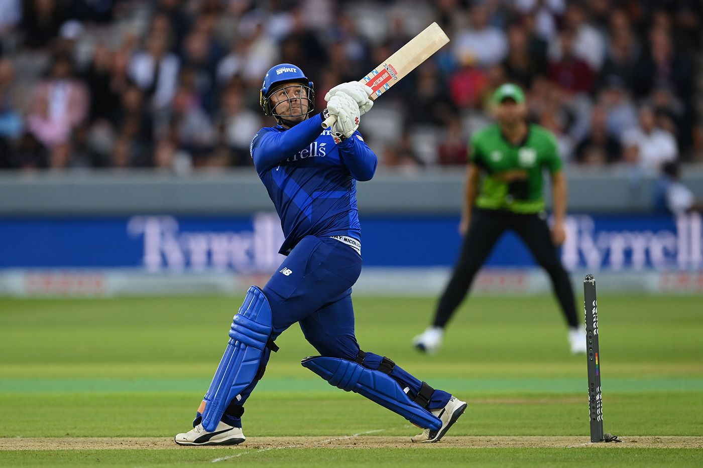 Adam Rossington swings over the leg side | ESPNcricinfo.com