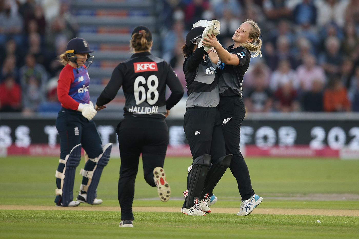 Jess Kerr celebrates making the opening incision | ESPNcricinfo.com