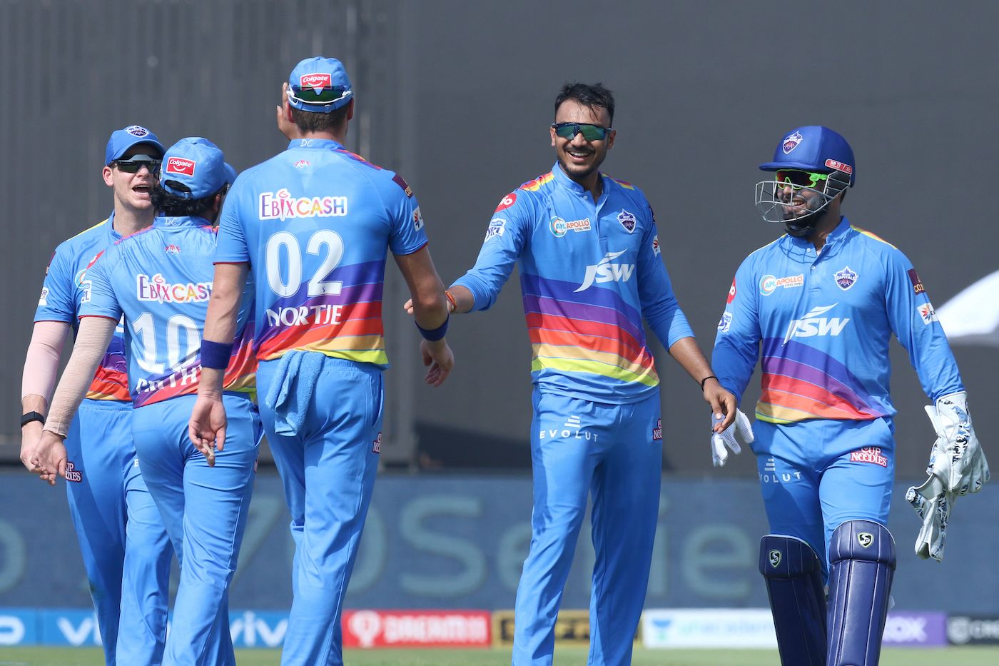 Axar Patel celebrates a wicket with his team-mates | ESPNcricinfo.com