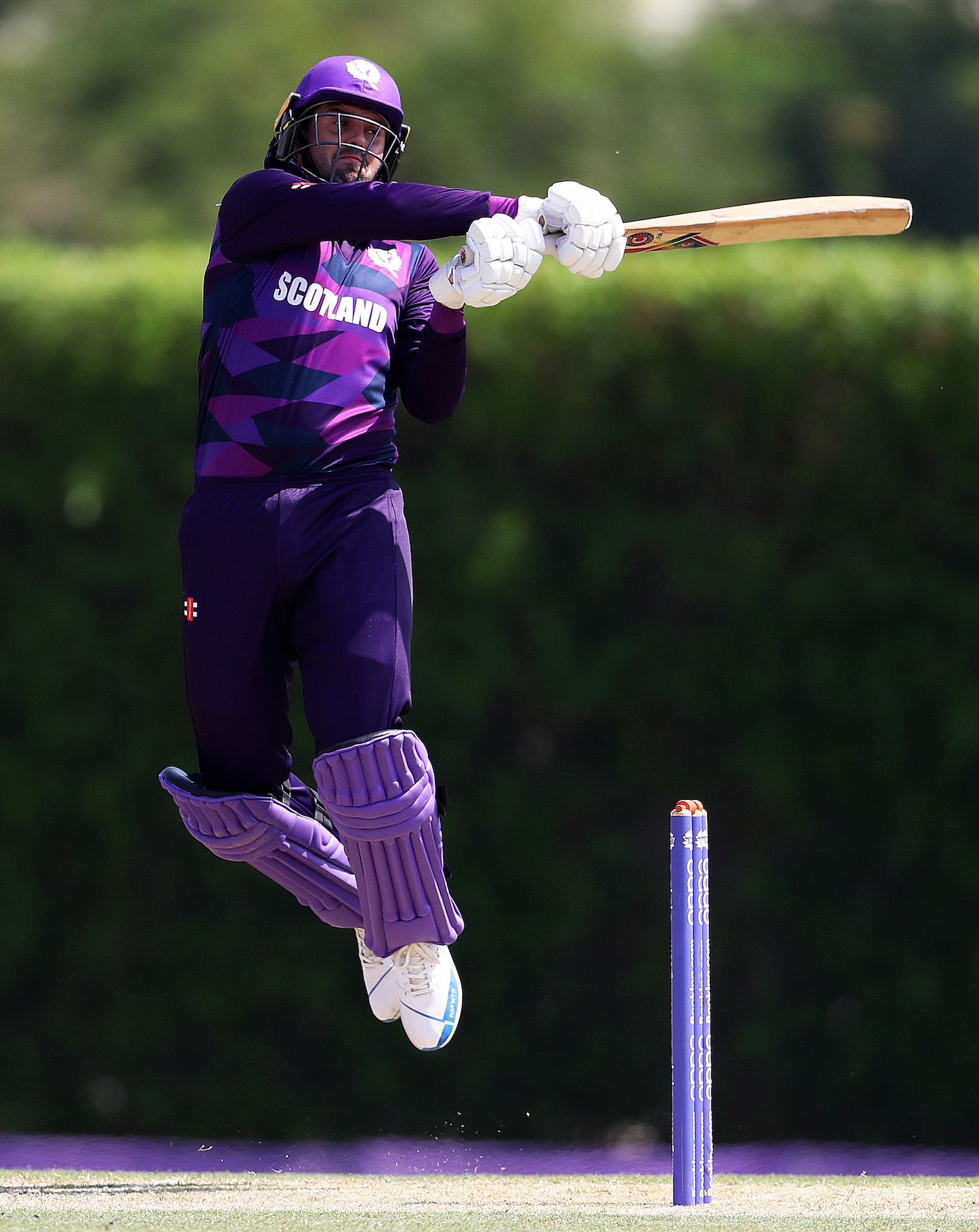 Calum MacLeod is air borne during his cameo | ESPNcricinfo.com