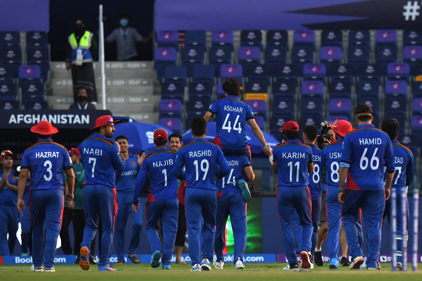 Asghar Afghan is carried by his team-mates after his final game ...