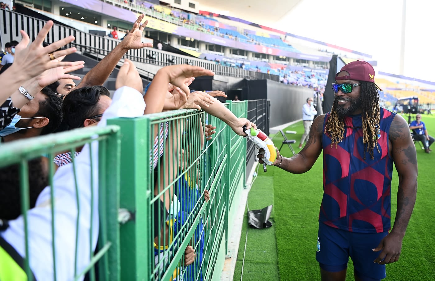 Chris Gayle gave away his gloves to fans in the stands | ESPNcricinfo.com