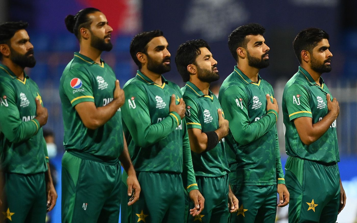 Pakistan's players have their hands on their hearts as their national ...