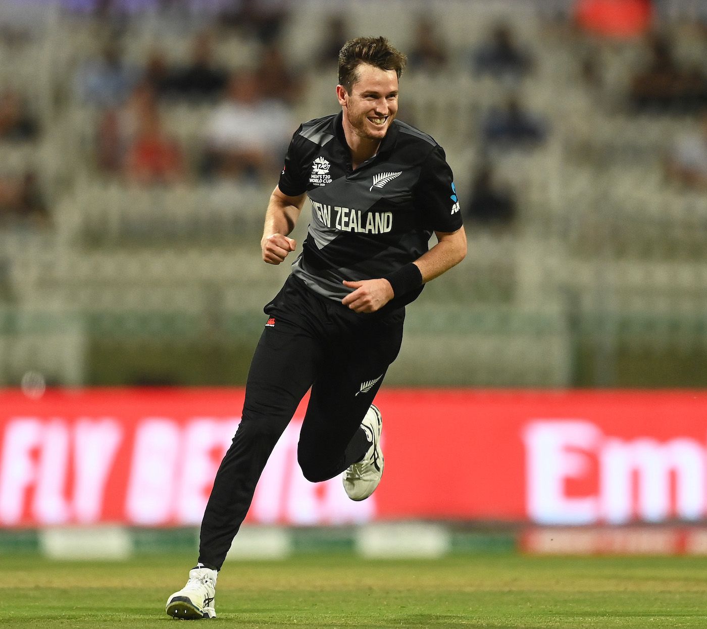Adam Milne is all smiles after getting Jonny Bairstow's wicket ...