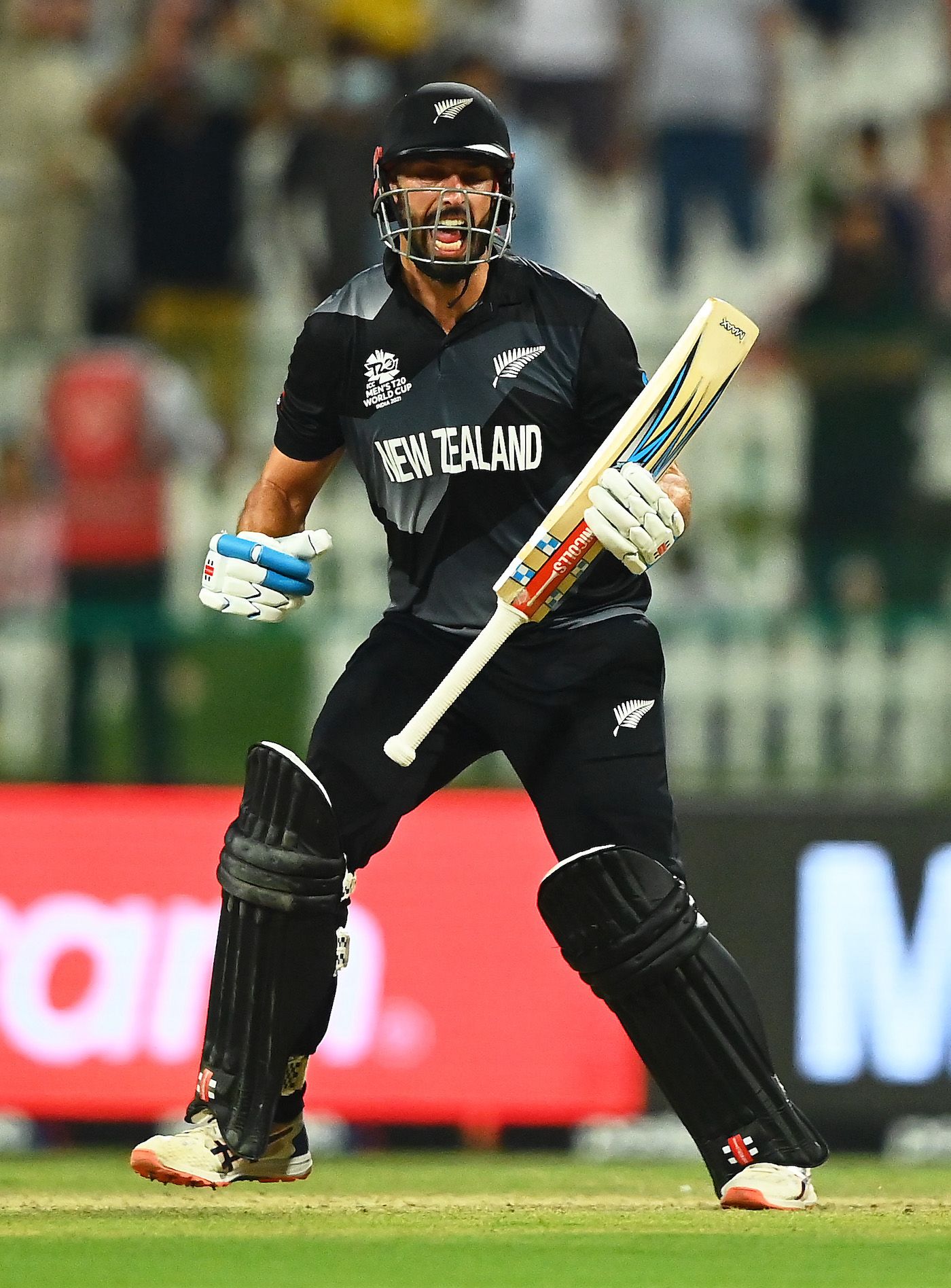 Daryl Mitchell lets out a roar as he realises he has hit a four to put ...