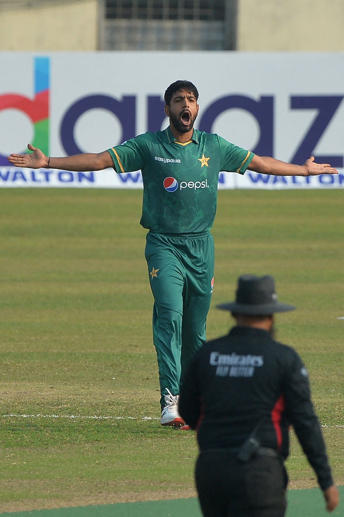 Haris Rauf kept things tight, and picked up the wicket of Mahmudullah ...